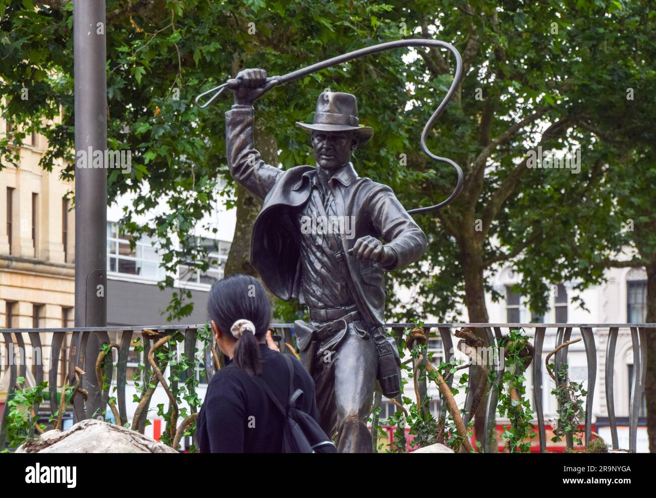 London, England, UK. 28th June, 2023. A passer-by takes photos of the ...