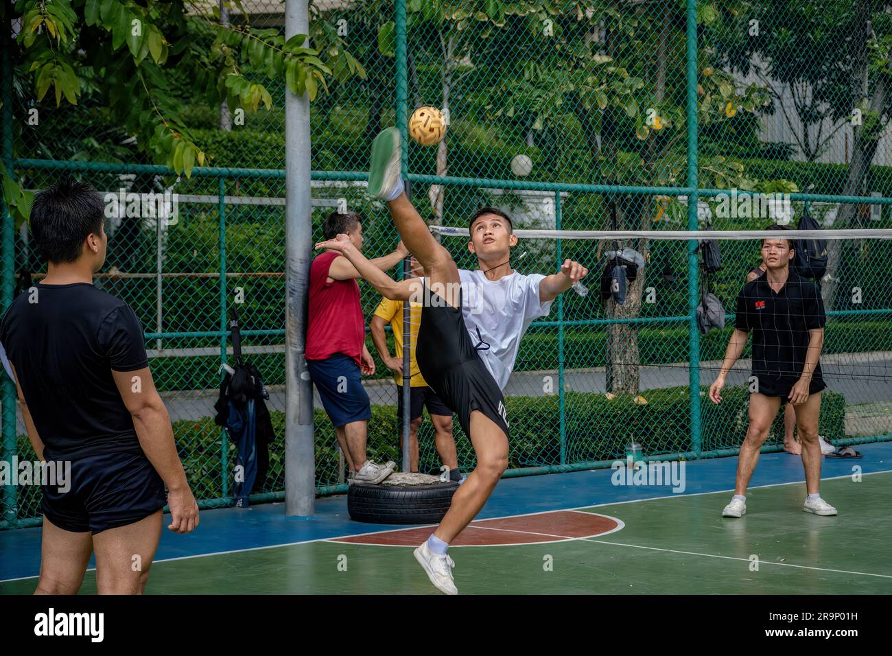 Bangkok, Thailand. 25th June, 2023. A Thai player of Sepak Takraw is ...