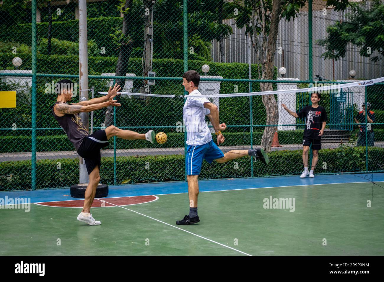 Bangkok, Thailand. 25th June, 2023. Thai and foreign players of Sepak Takraw are seen playing a ...