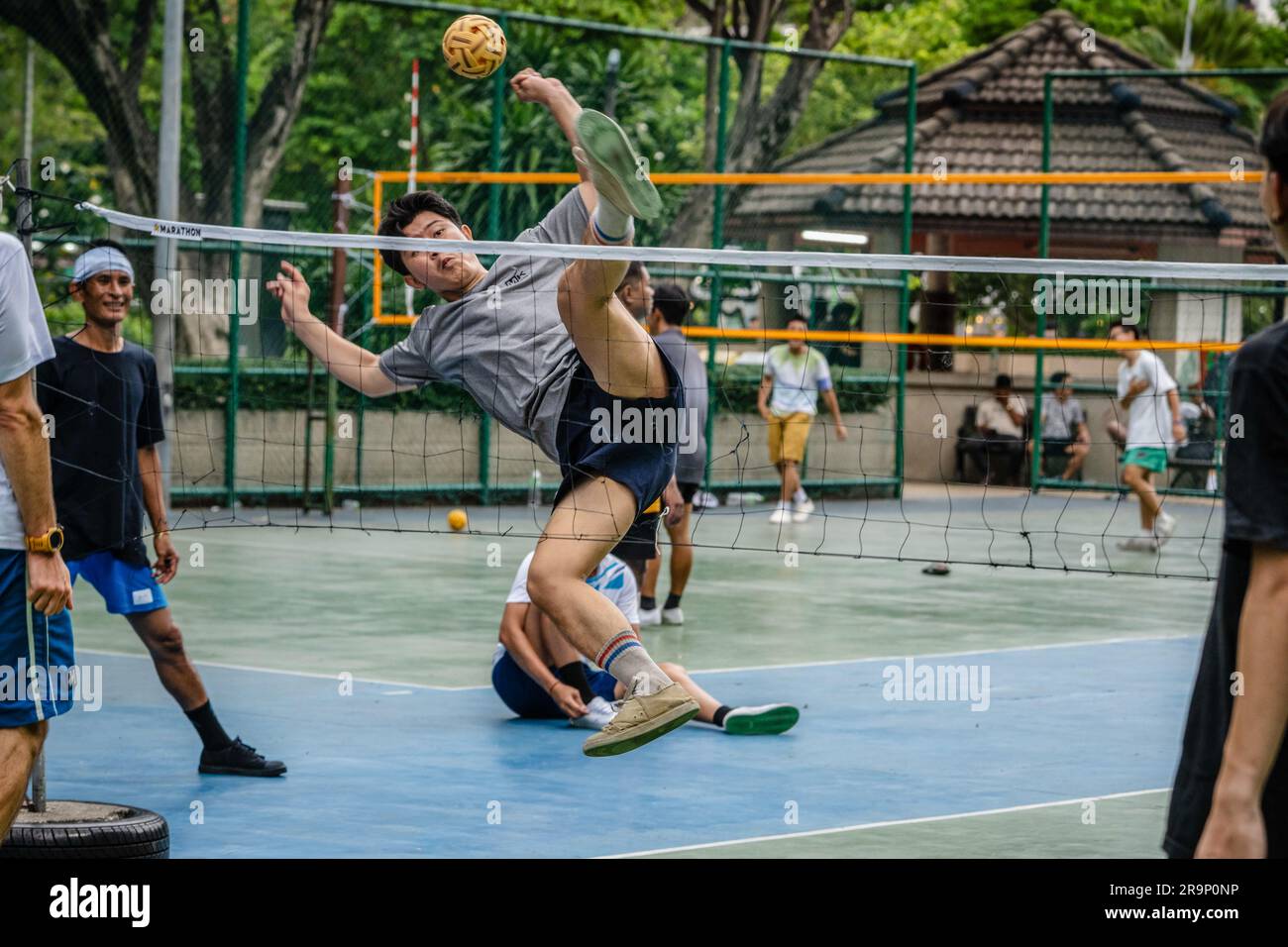 Bangkok, Thailand. 25th June, 2023. Local residents are seen playing ...