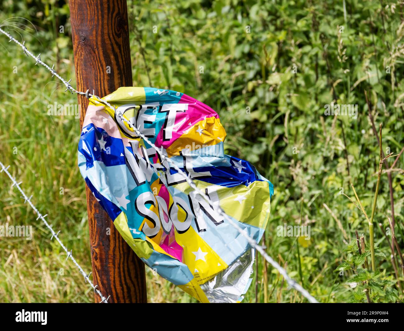 Balloon caught on fence hi-res stock photography and images - Alamy