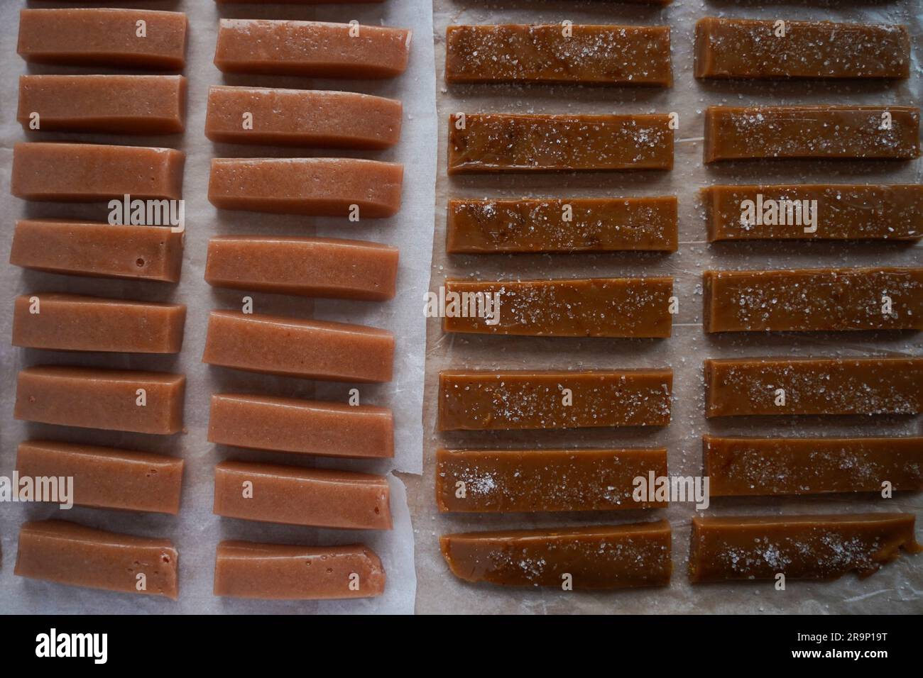 Caramel candies Conveyor. Chocolate and Caramel Factory Stock Photo - Alamy