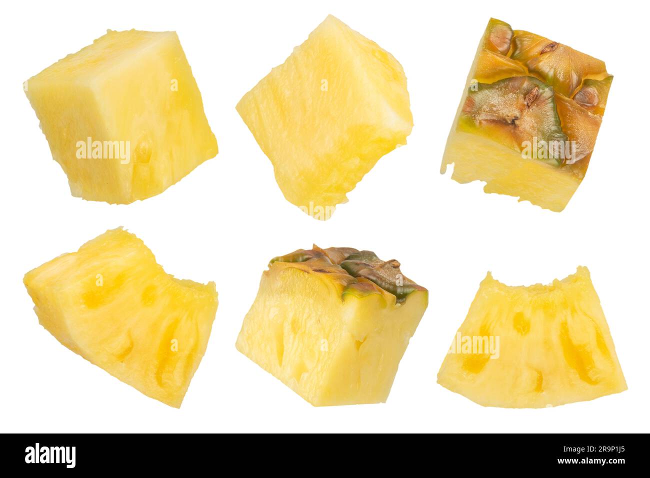 Pieces of pineapple on a white isolated background. Juicy pineapple cut ...