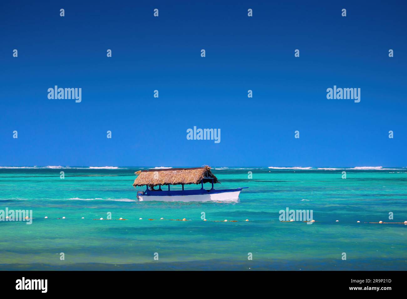 Speed boat surfing over the clear water of caribbean sea, summer ...