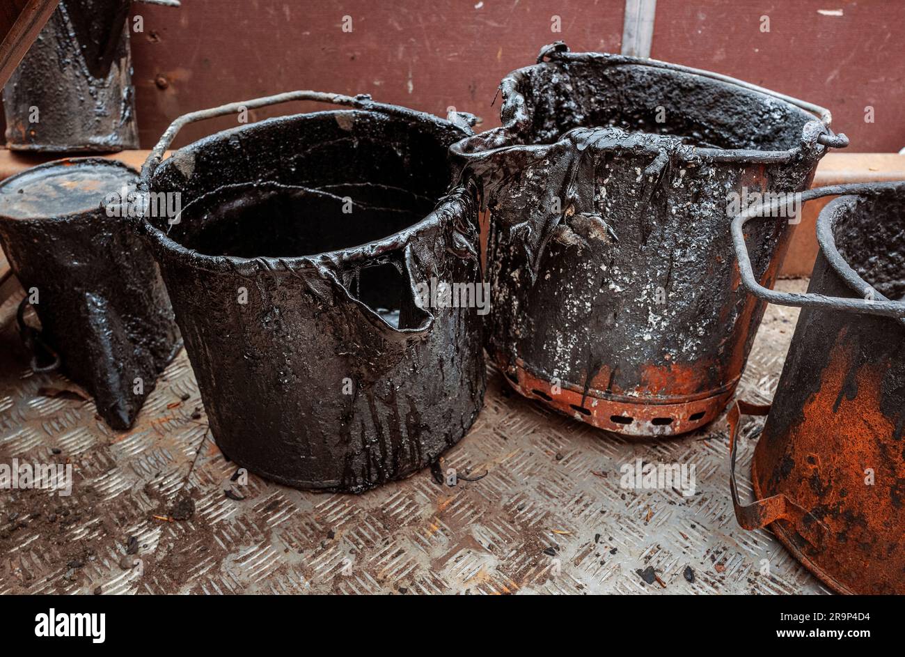 Bucket With Tar At A Road Construction Site, Berlin, Germany Stock ...