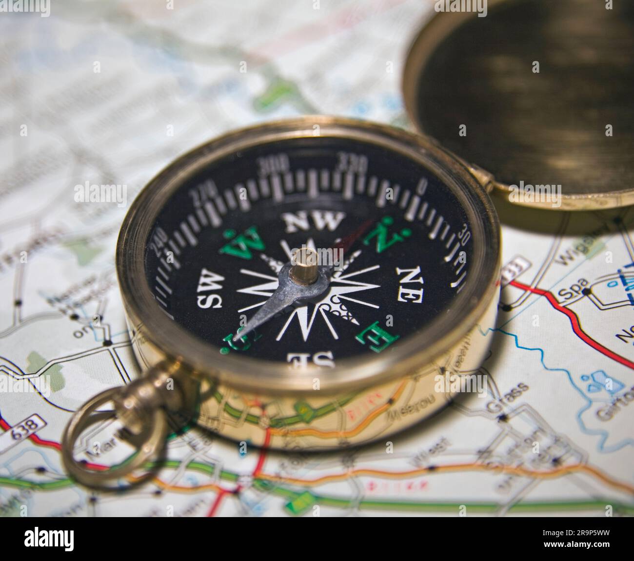 Compass and Map Stock Photo - Alamy