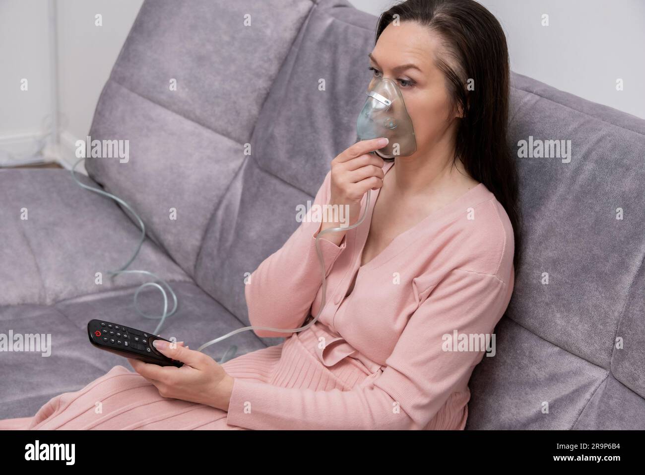 The woman inhales the respiratory tract and lungs when applying drugs ...