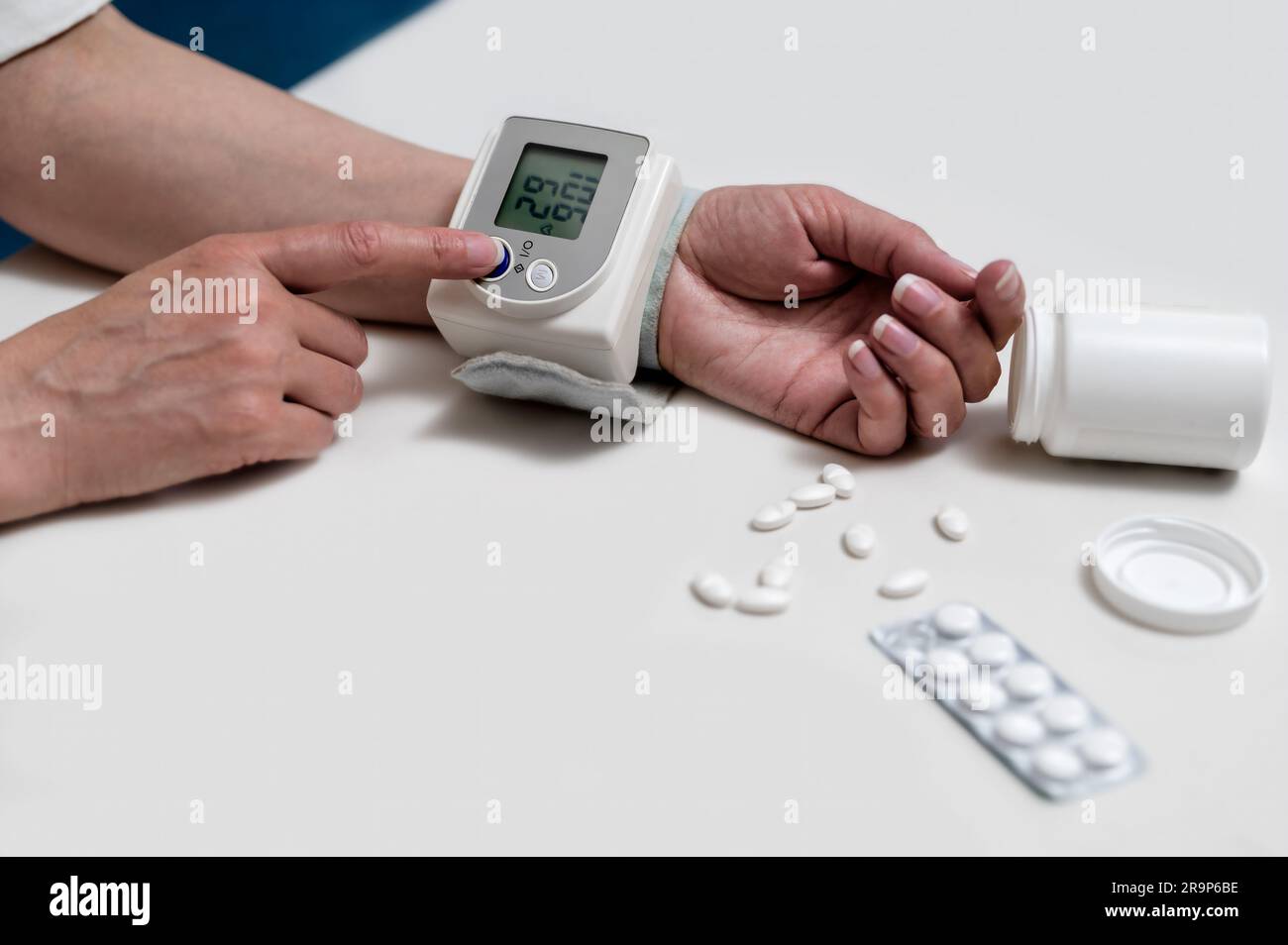 Measuring blood pressure at home. modern digital blood pressure monitor ...