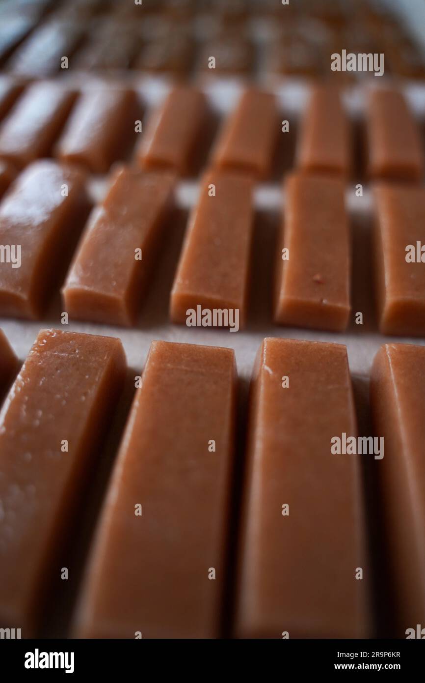 Caramel candies Conveyor. Chocolate and Caramel Factory Stock Photo - Alamy