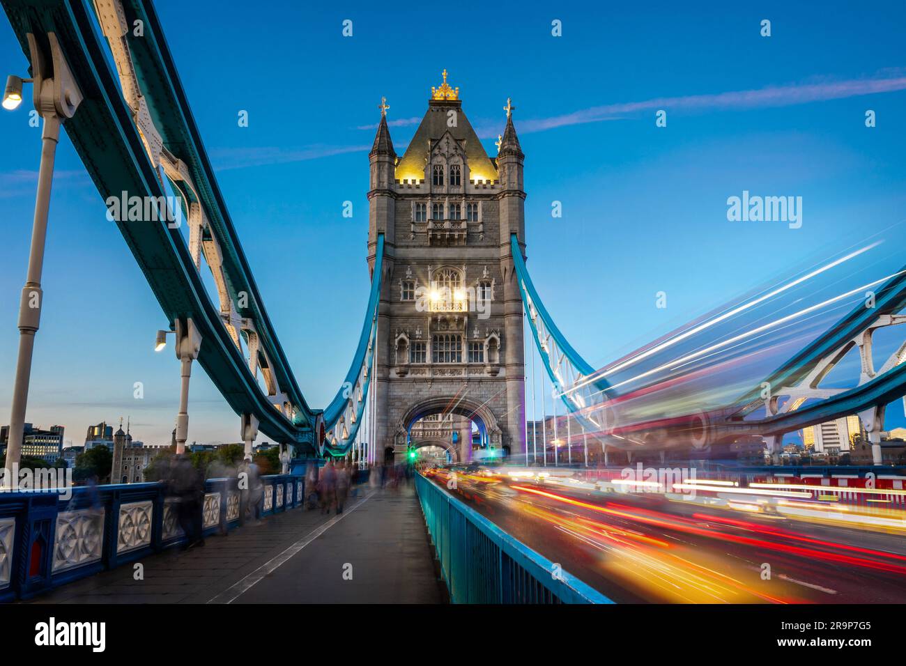 Cars and buses lights rays on the Tower Bridge at night in London, UK ...