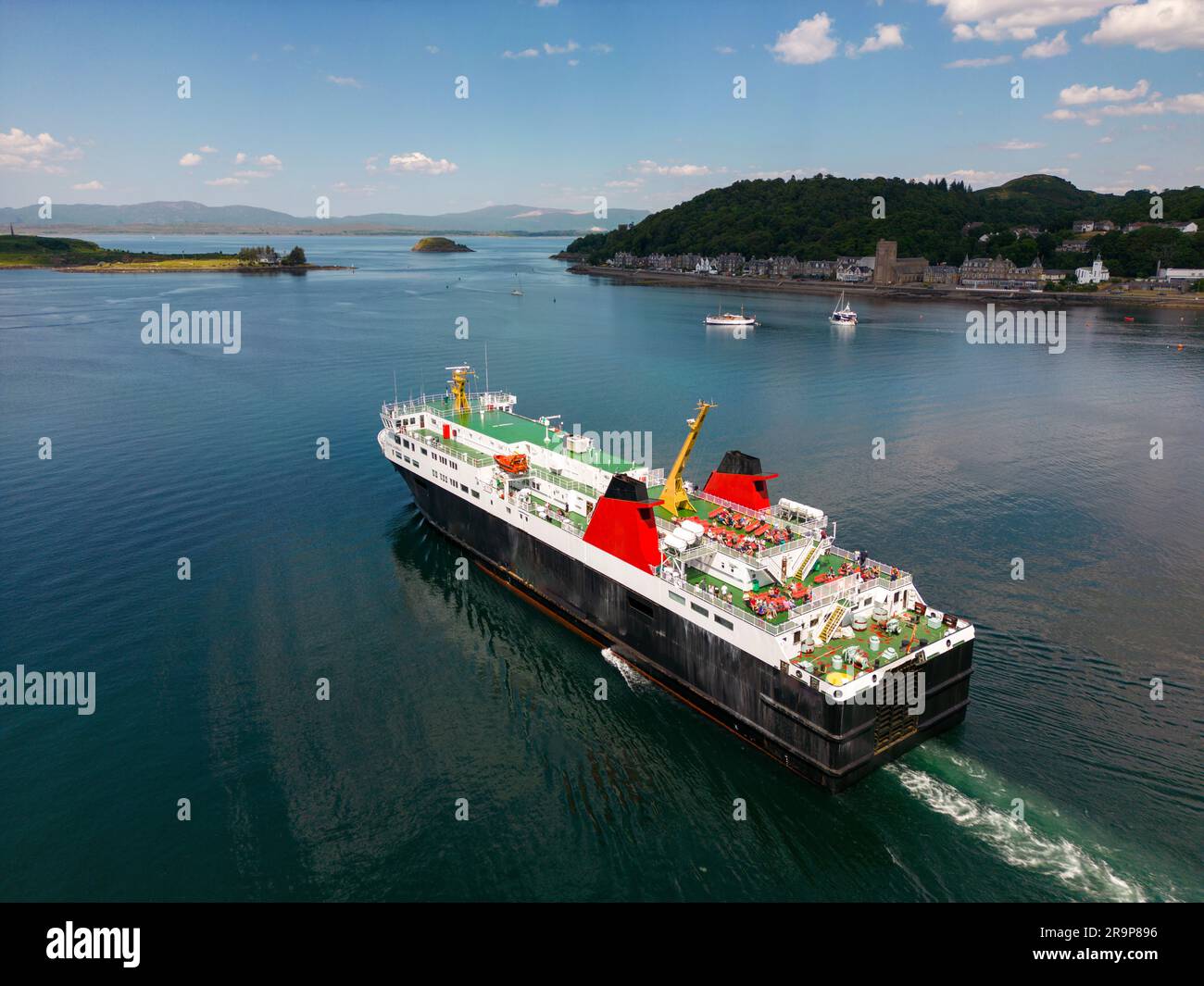 Aerial drone photo of a large ferry boat in Oban Scotland Stock Photo ...