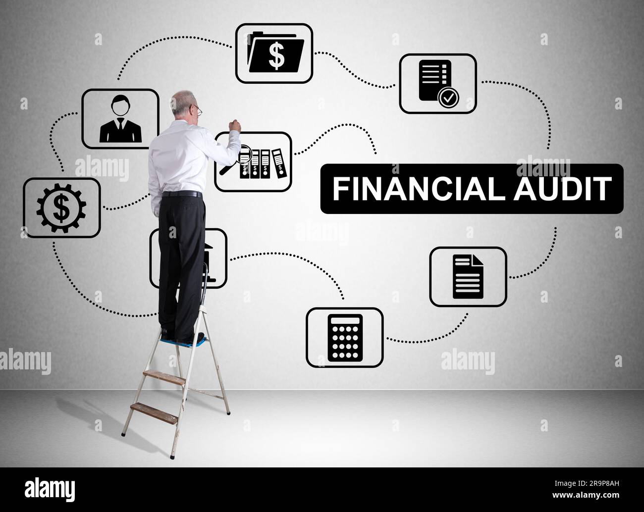 Man on a ladder drawing financial audit concept on a wall Stock Photo ...
