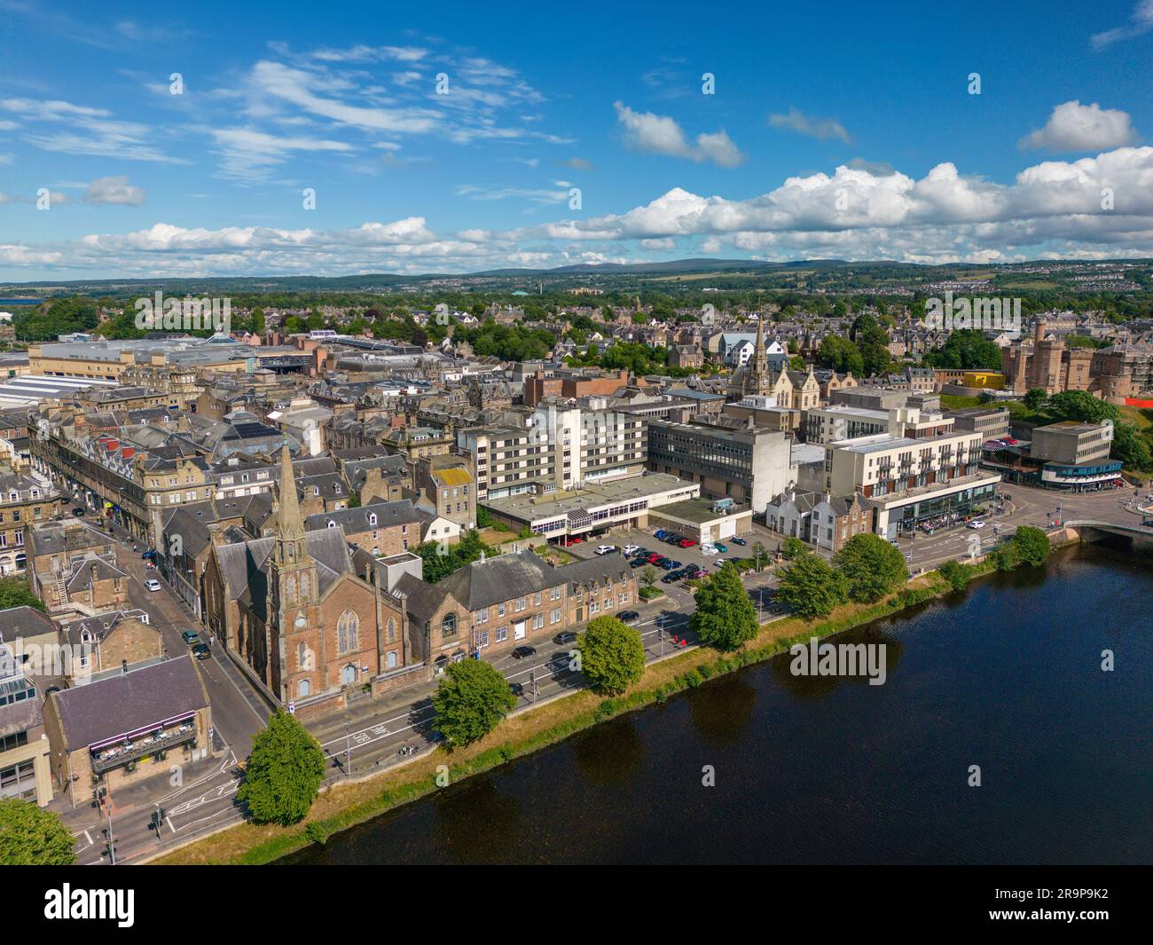 Aerial drone photo of the town centre and churches in Inverness next to ...