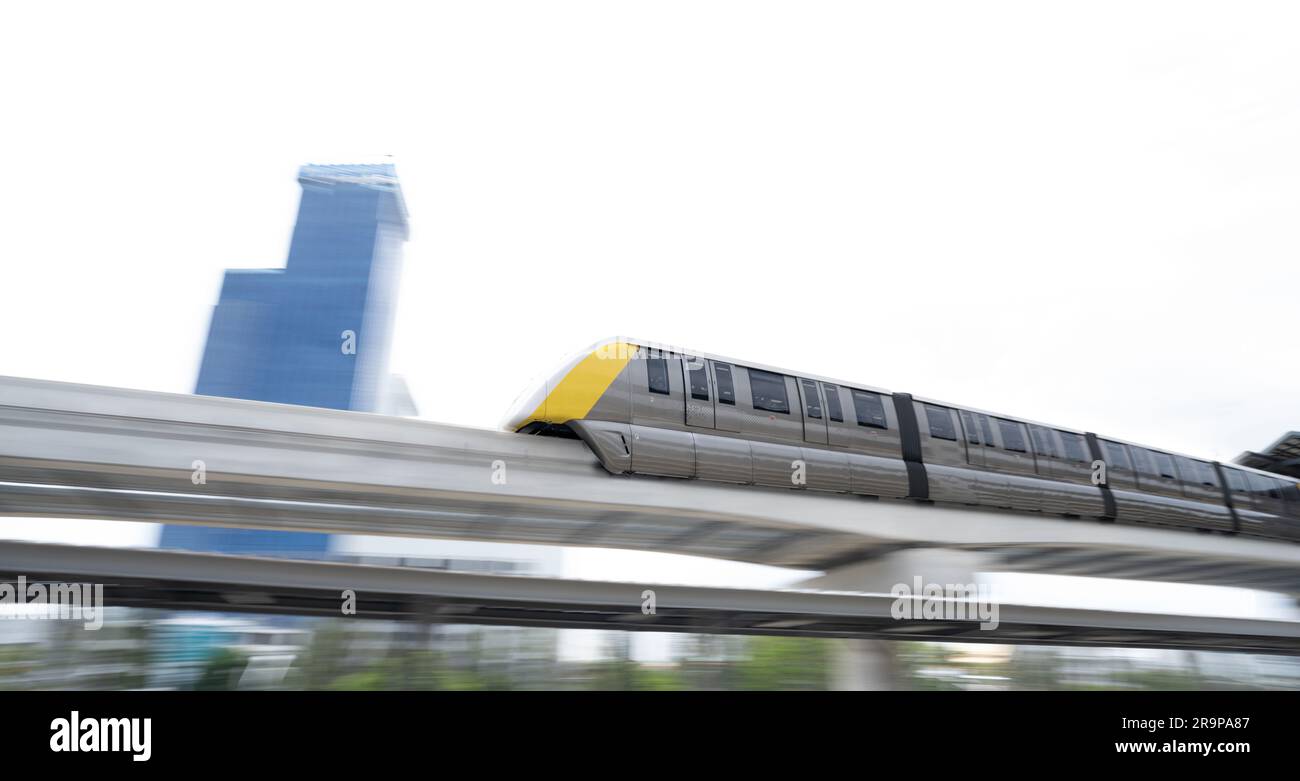Elevated monorail train fast move on rail. Public transit monorail. Modern mass transit. Rail ...