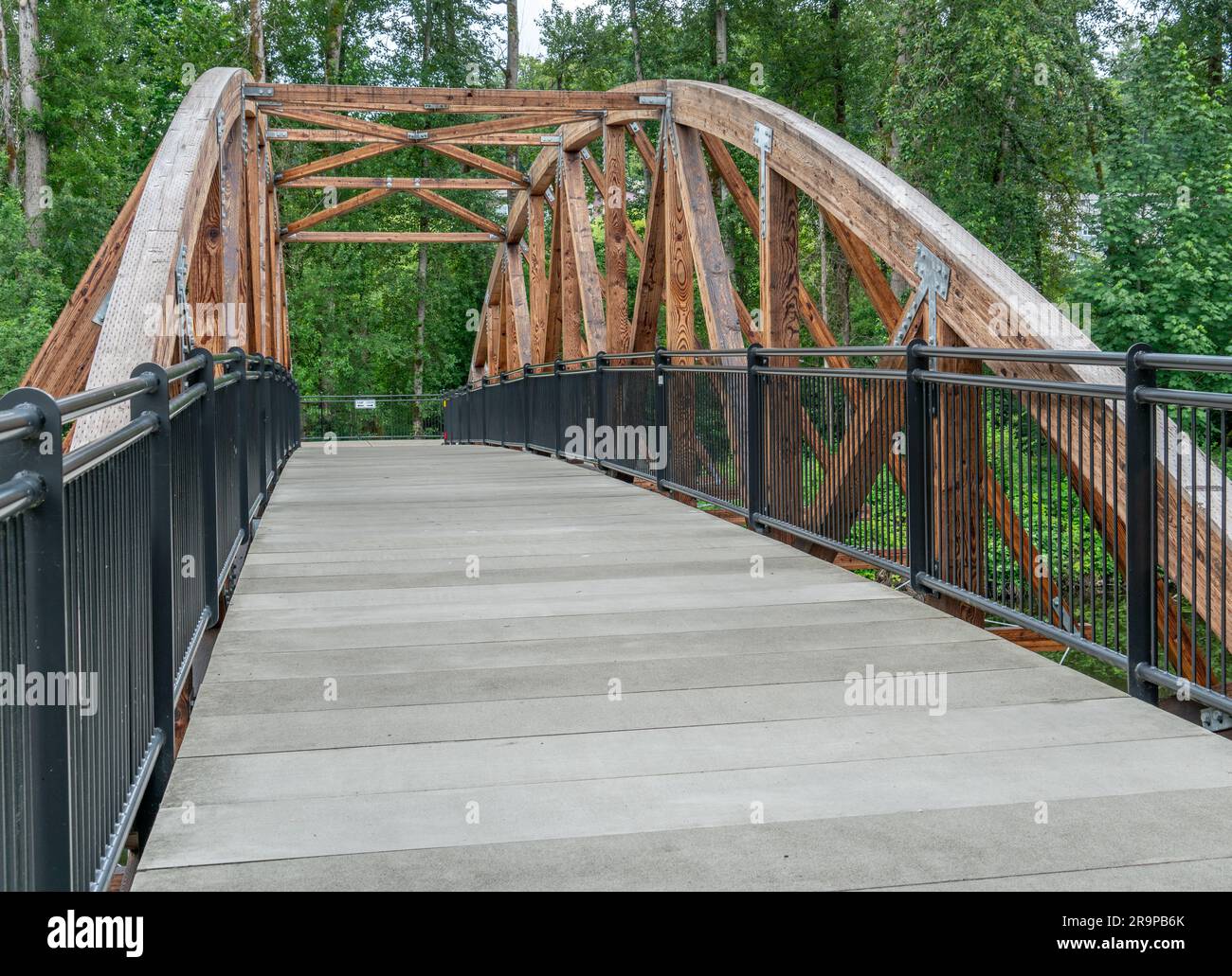A walkway onto a pedestrian bridge in Bothell, Washington Stock Photo ...
