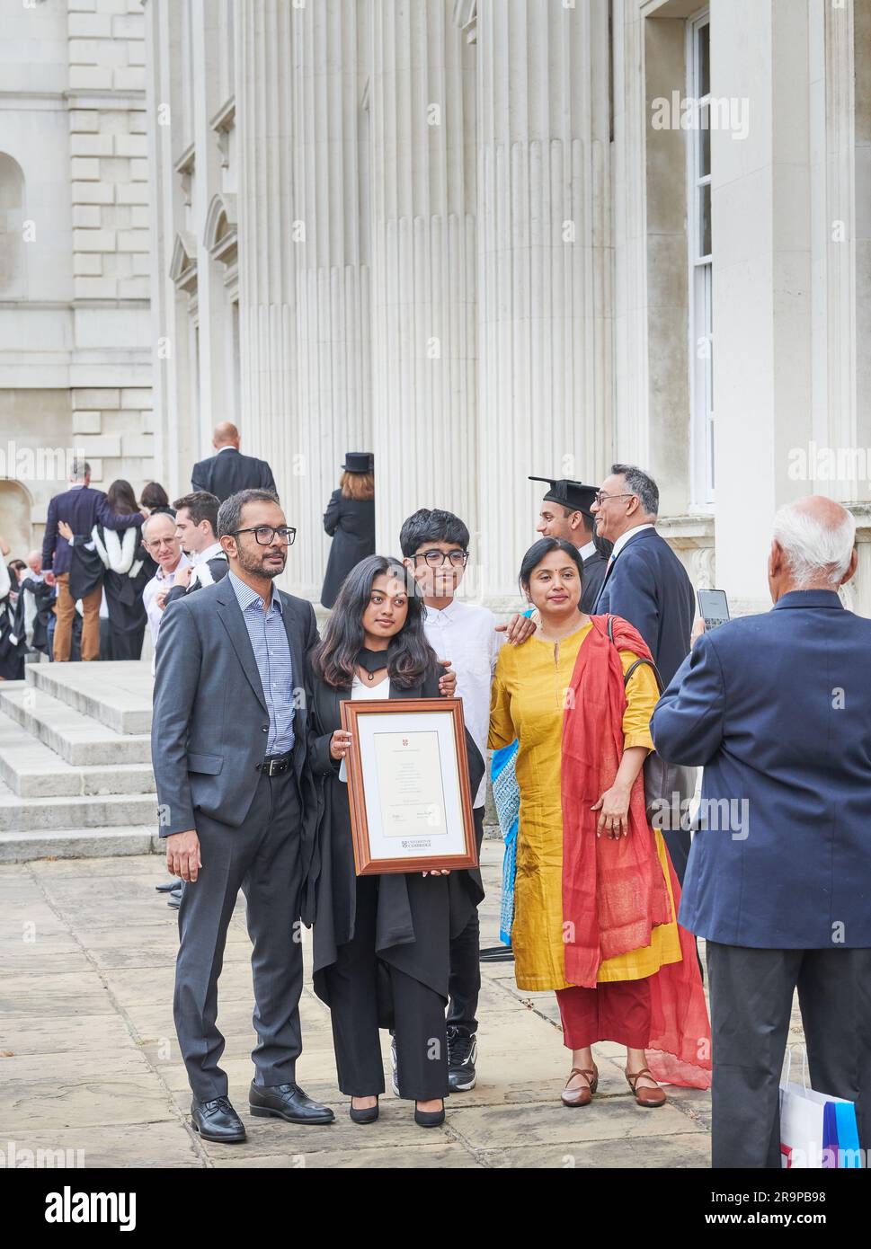 A female student and family celebrate outside Senate House, University ...