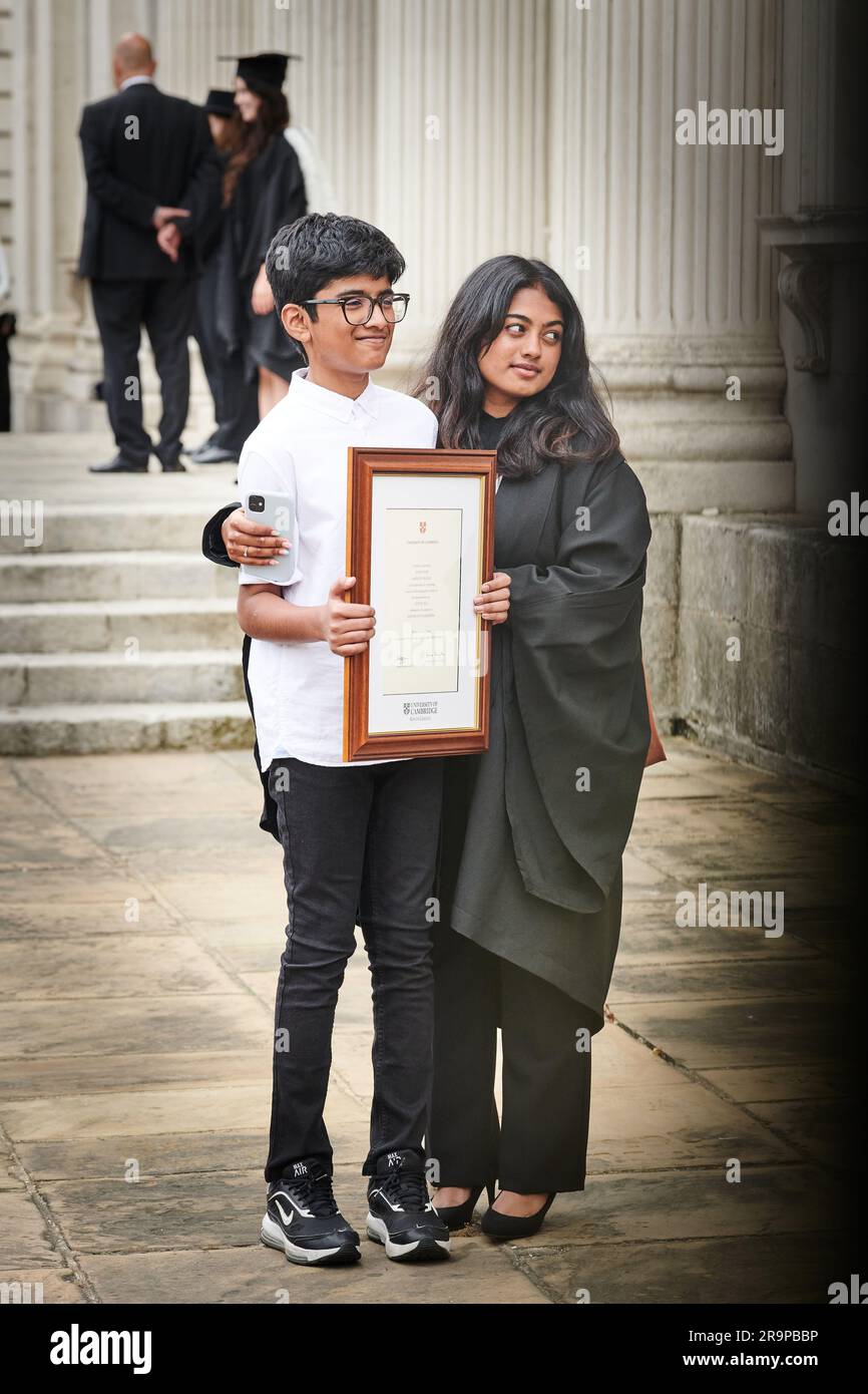 A female student and brother celebrate outside Senate House, University ...