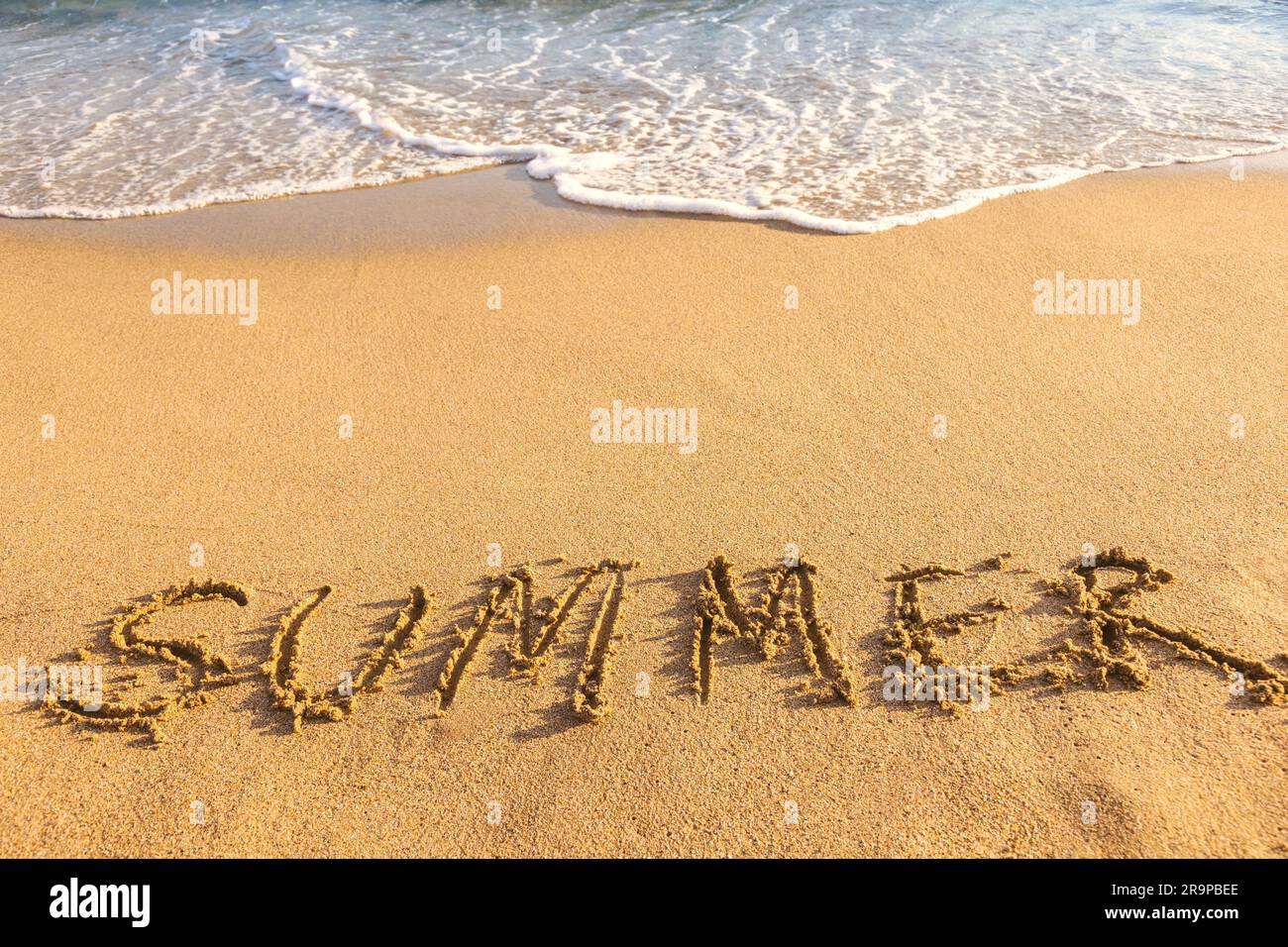 Wave washing onto beach hi-res stock photography and images - Alamy