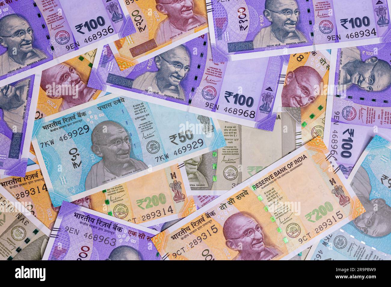 A close-up of Indian rupee banknotes lying around Stock Photo - Alamy