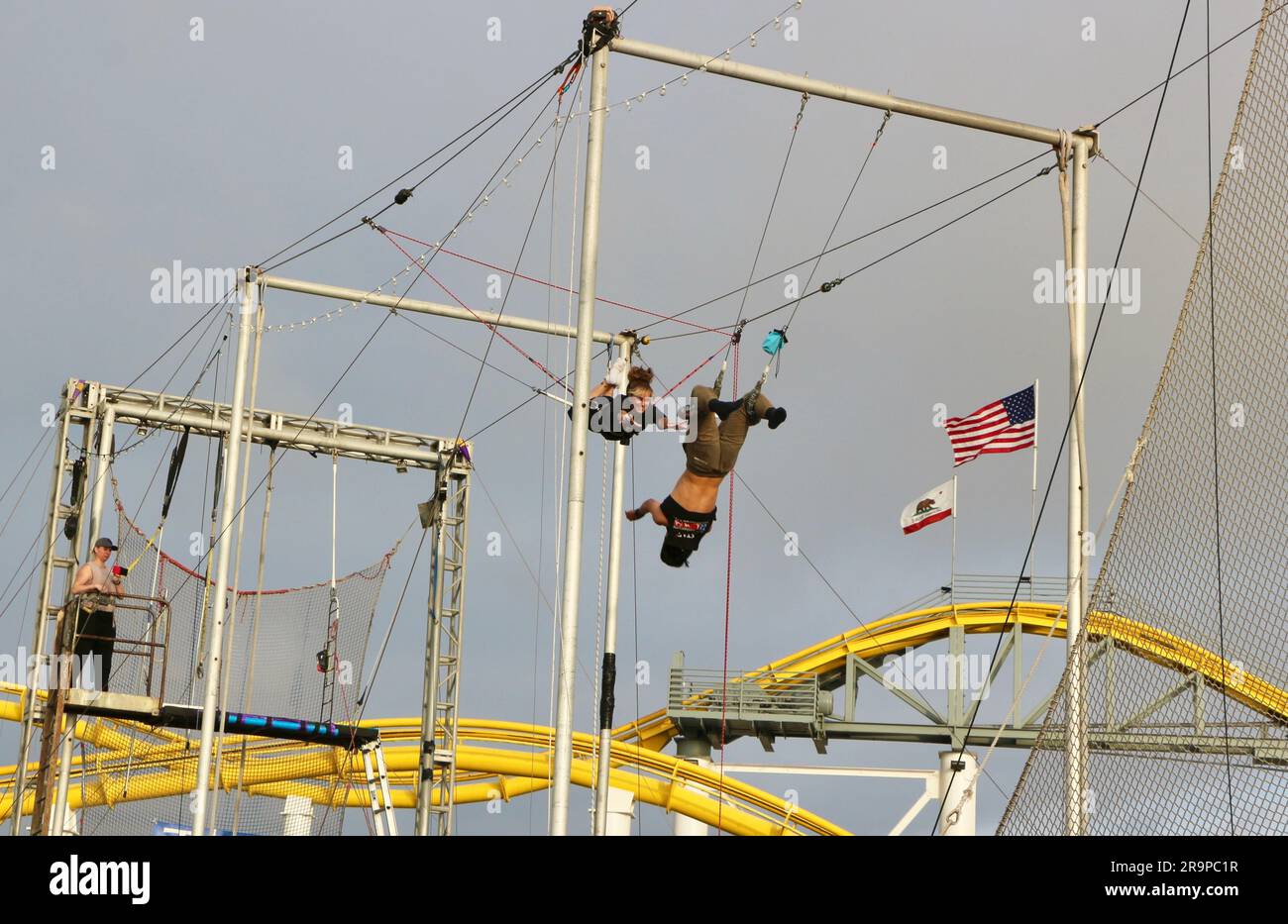 People enjoying the Flying Trapeze at the Santa Monica Trapeze School ...