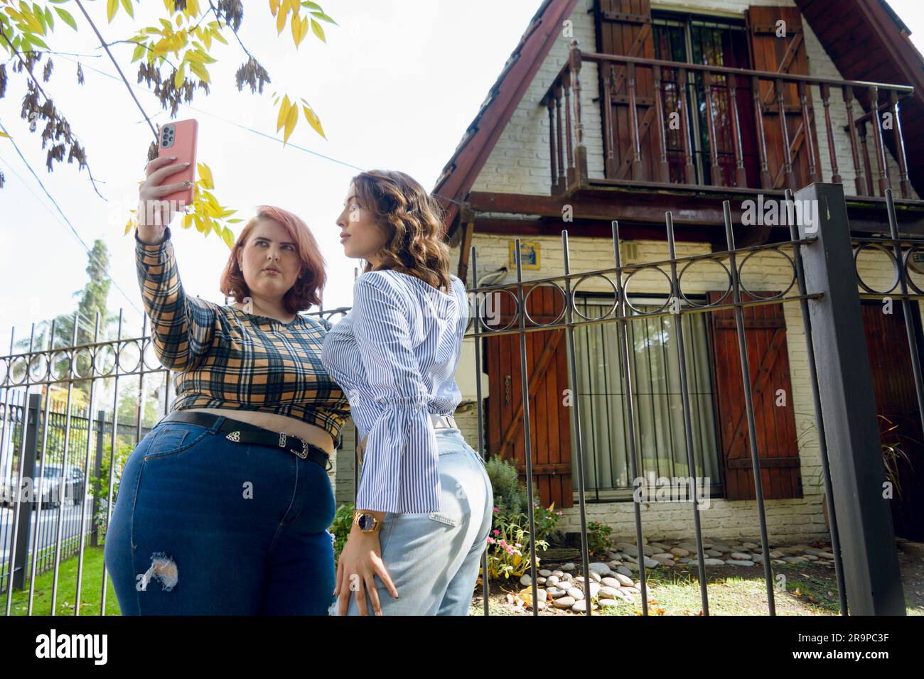 Two elegant young Latina women friends of Argentinian ethnicity, are ...