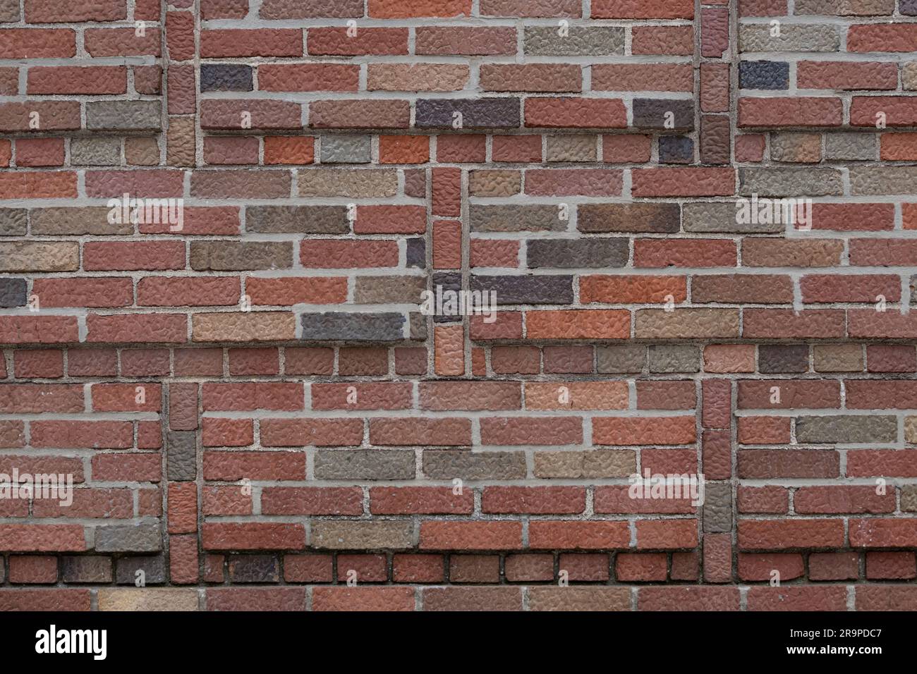 artisanal brick wall, in multi-color shades of red, terra cotta, brown ...