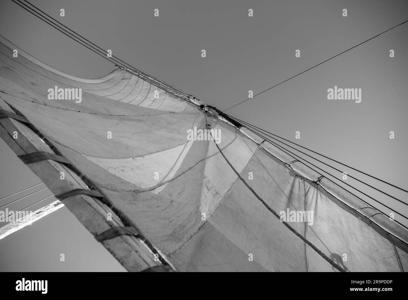 Boat sailing in blue mediterranean Black and White Stock Photos ...