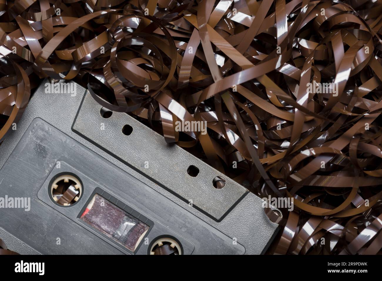 Cassette tape with pull-out tape Stock Photo - Alamy