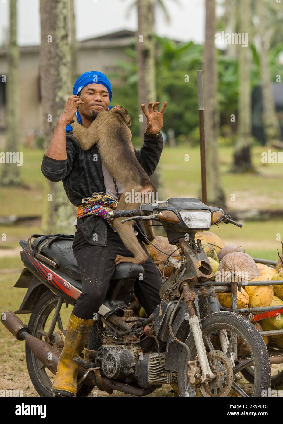 Men with his monkey Stock Photo - Alamy