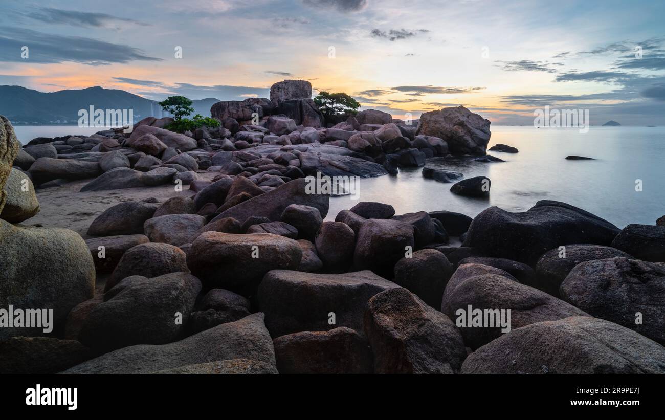 Sunrise at Hon Chong tourist area, Nha Trang city, Vietnam Stock Photo ...