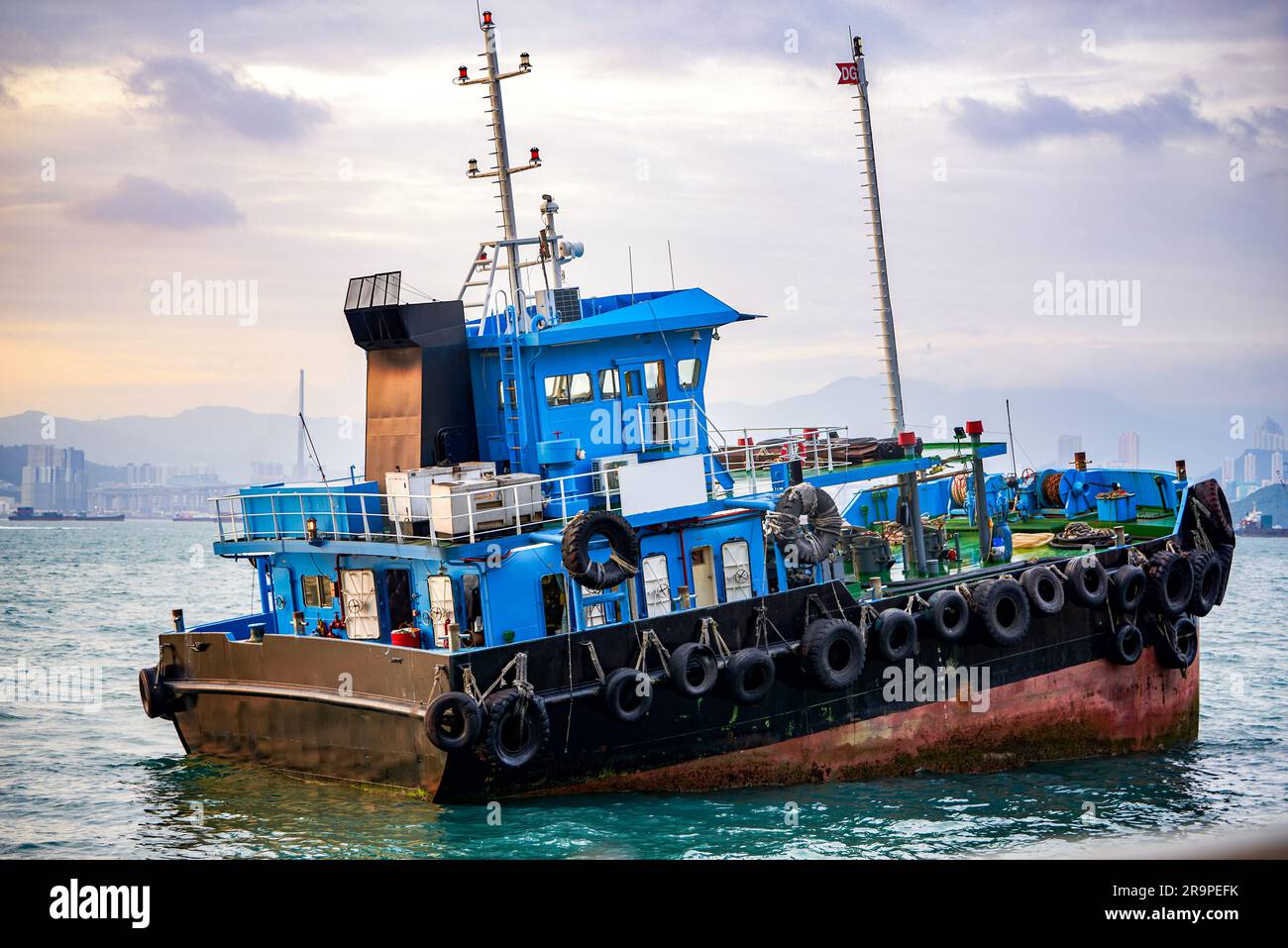 Large fishing boats docked by the sea in Hong Kong Stock Photo - Alamy