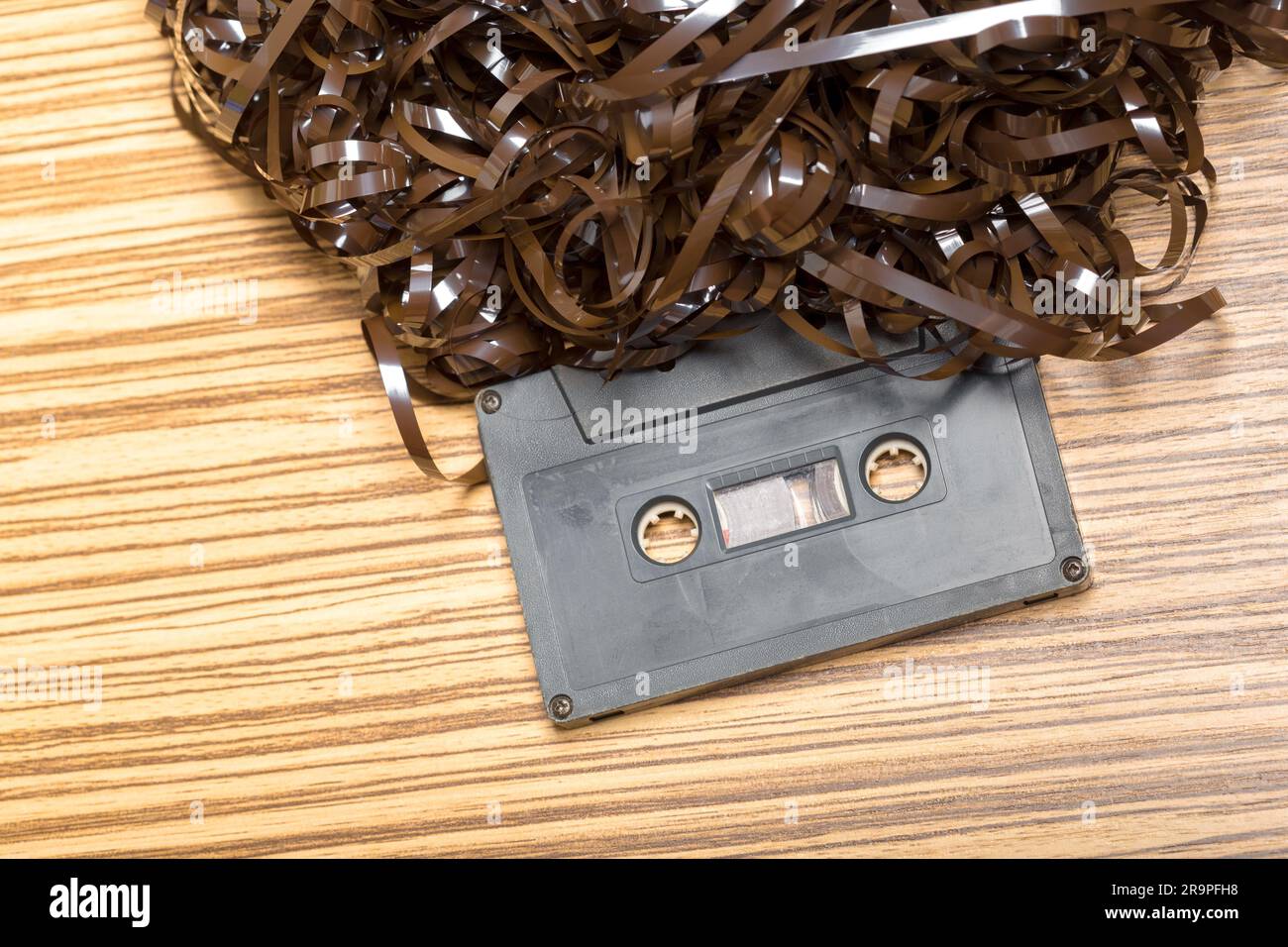 Cassette tape with pull-out tape Stock Photo - Alamy