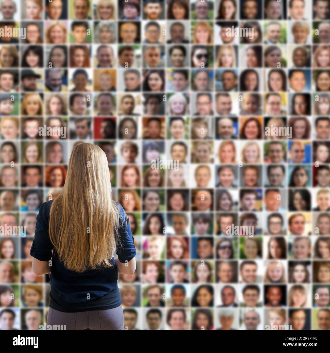 blond woman looking at a wall with many people faces, social media ...