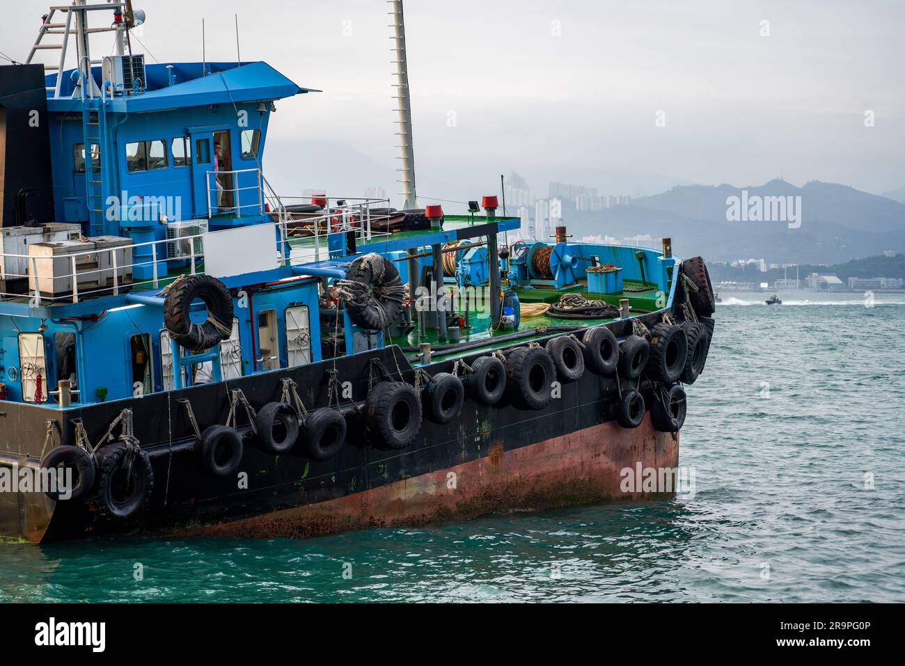 Large fishing boats docked by the sea in Hong Kong Stock Photo - Alamy