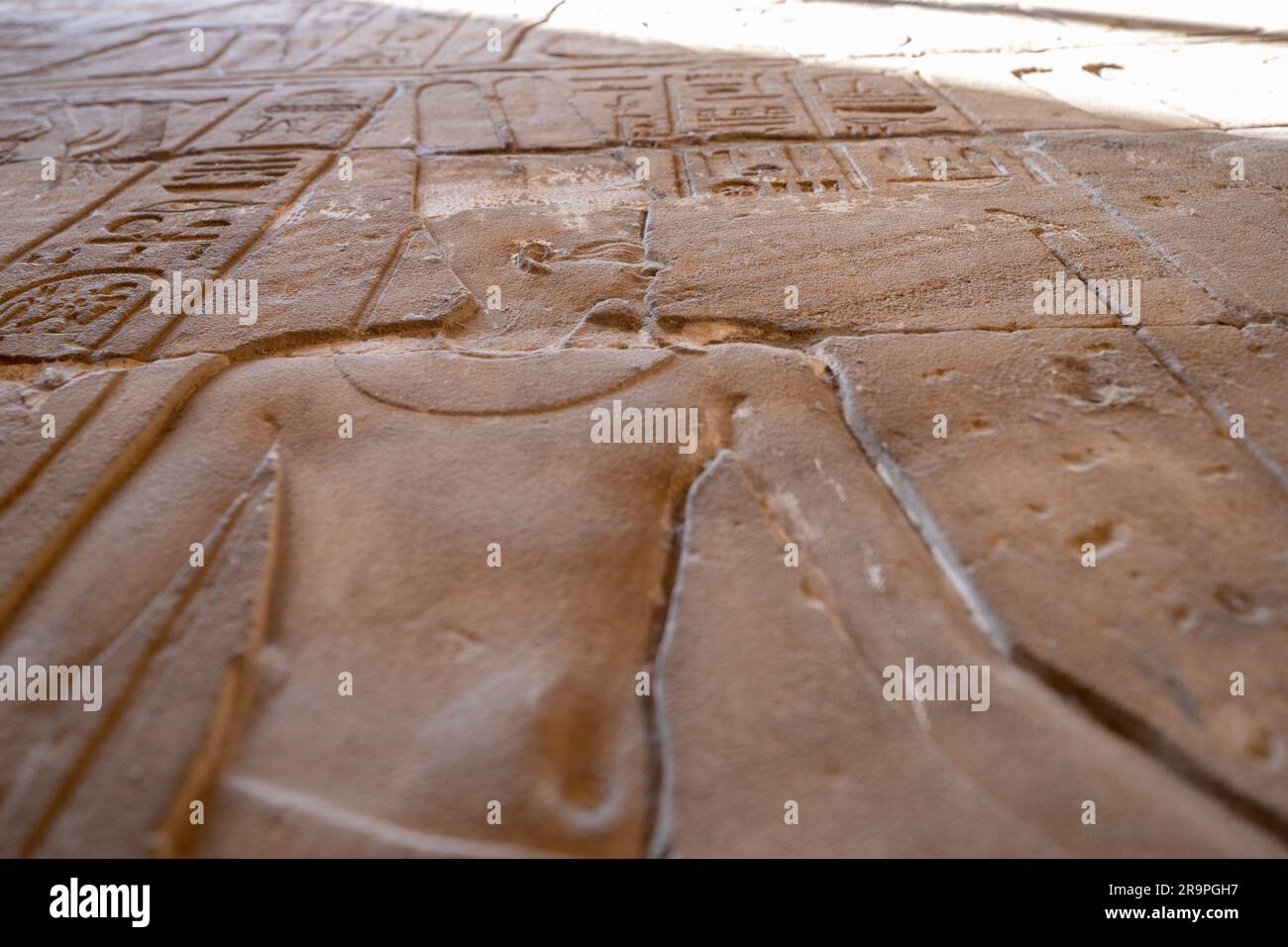 Egyptian Hieroglyphics written on a wall Stock Photo - Alamy