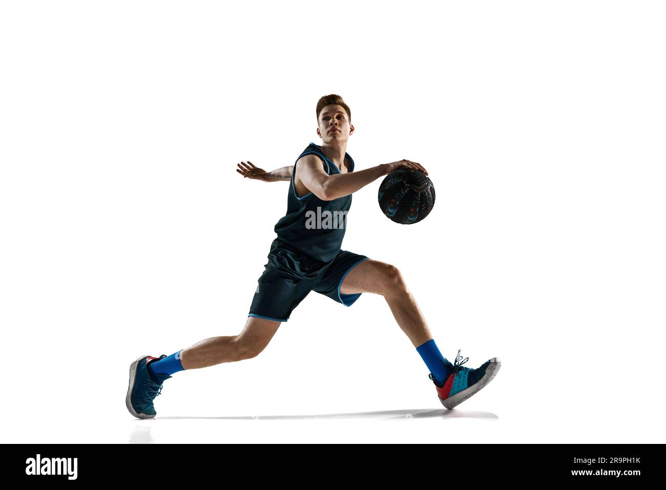 Young man, professional basketball player during game, training ...