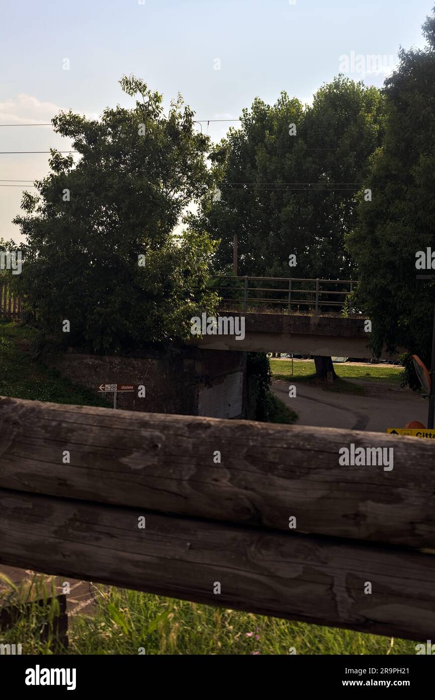Dirt path under a bridge in a park seen from above at sunset Stock ...