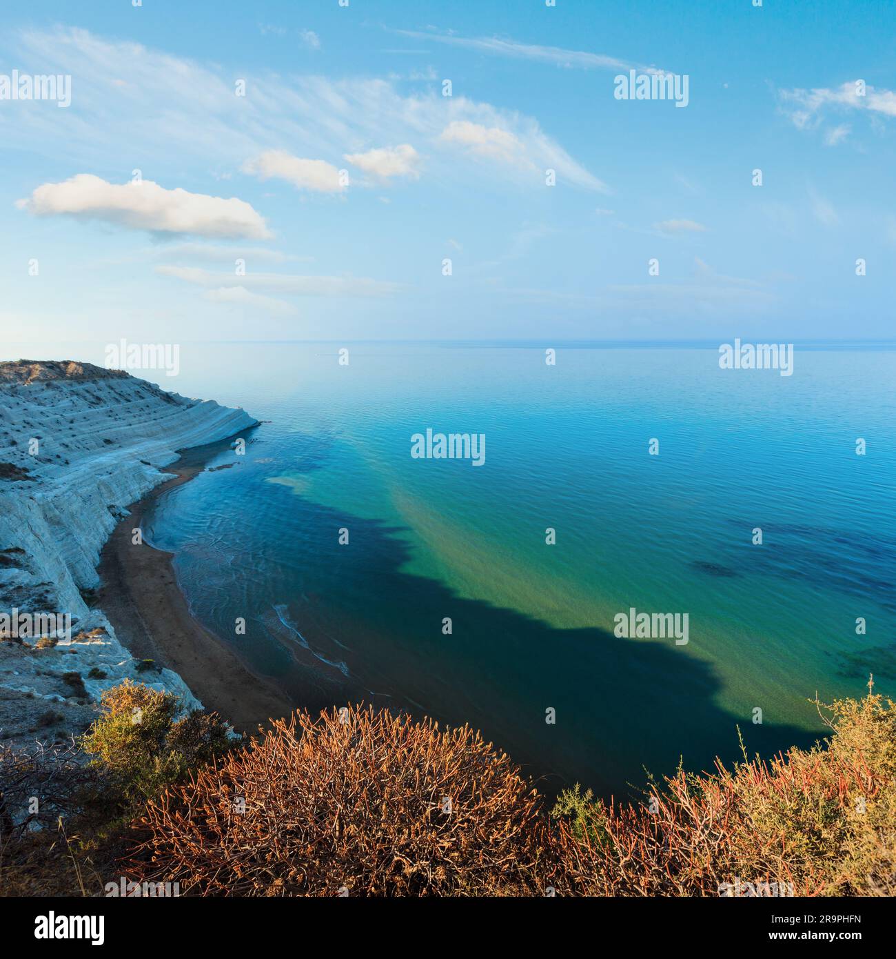 Sandy beach under famed white cliff, called "Scala dei Turchi", in ...