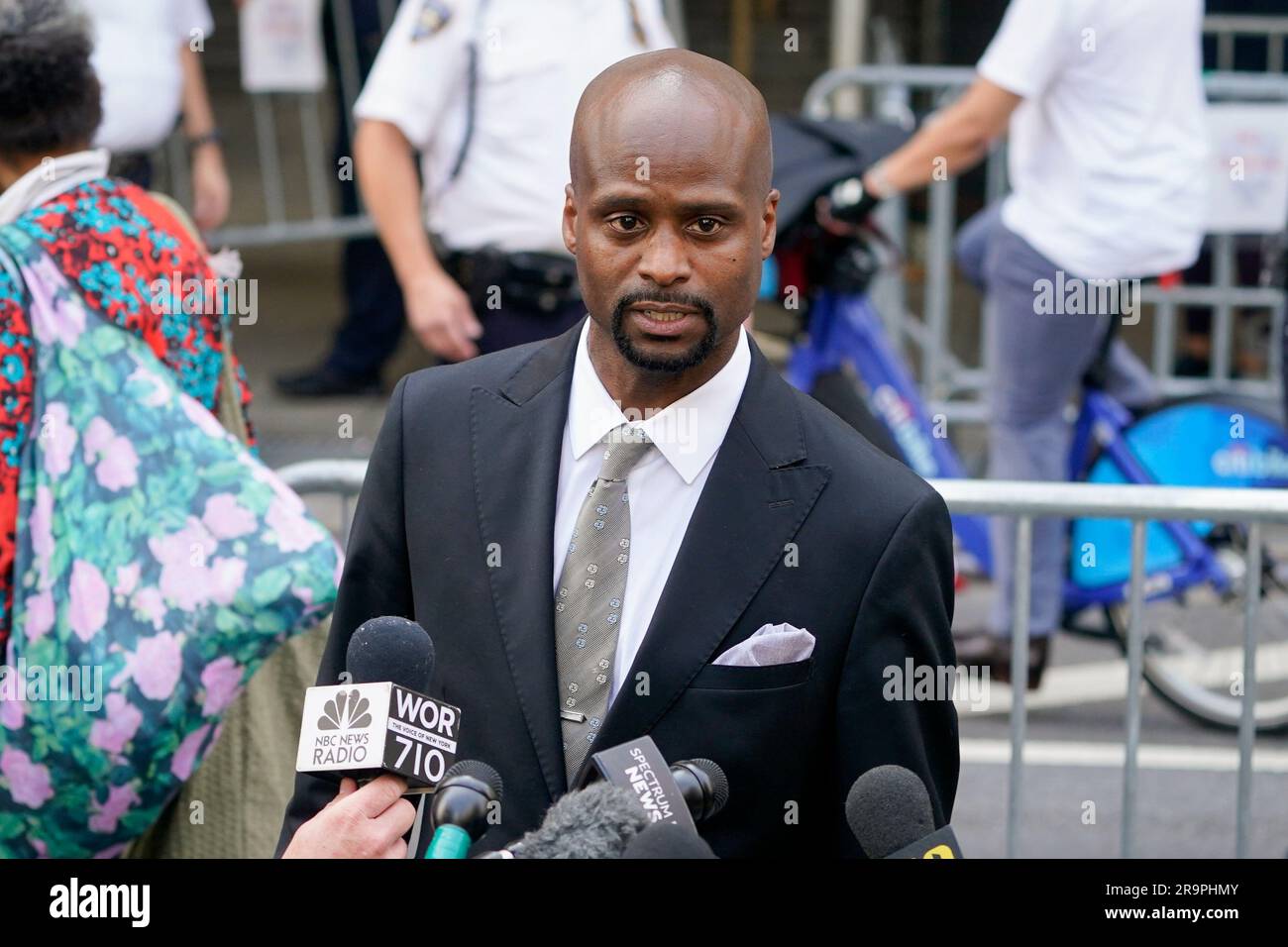 Donte Mills, a lawyer for Jordan Neely's family, speaks to members of the media outside ...