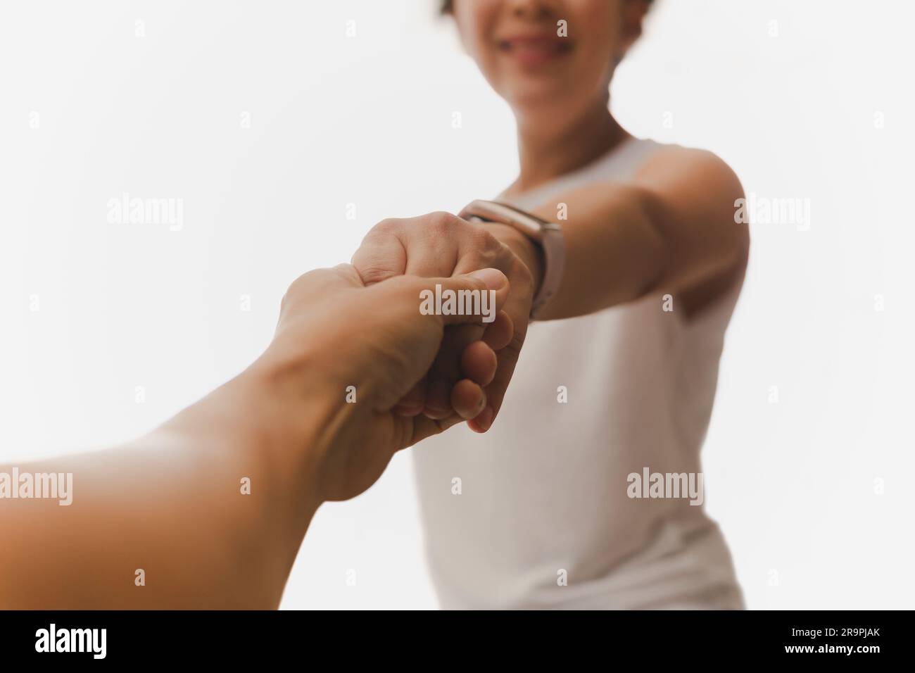 Help concept woman hands reaching to help each other Stock Photo - Alamy