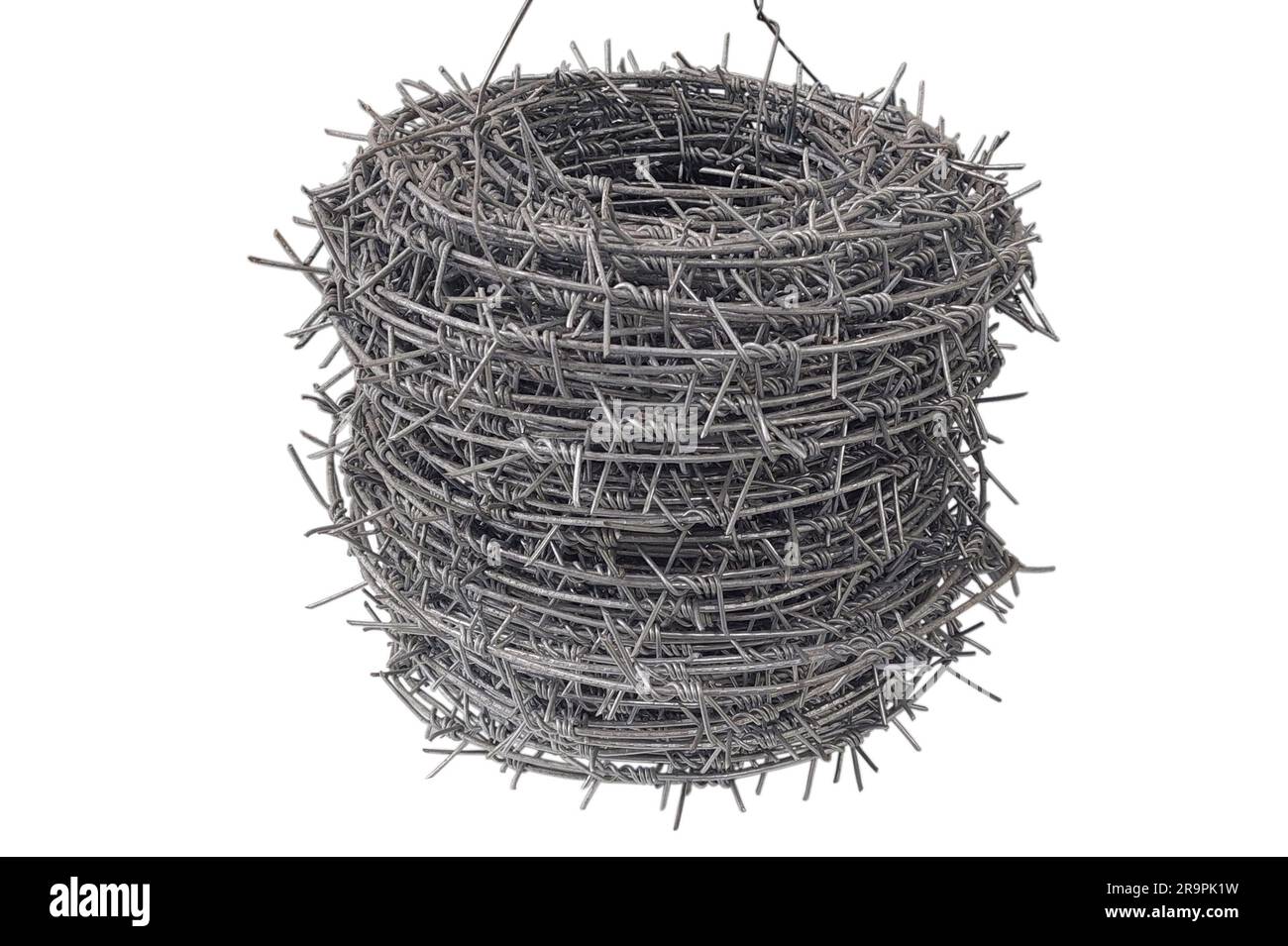 Coil of steel barbed wire isolated on white background Stock Photo - Alamy