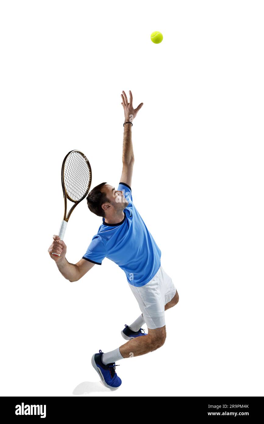 Full-length dynamic image of man, professional tennis player in motion ...