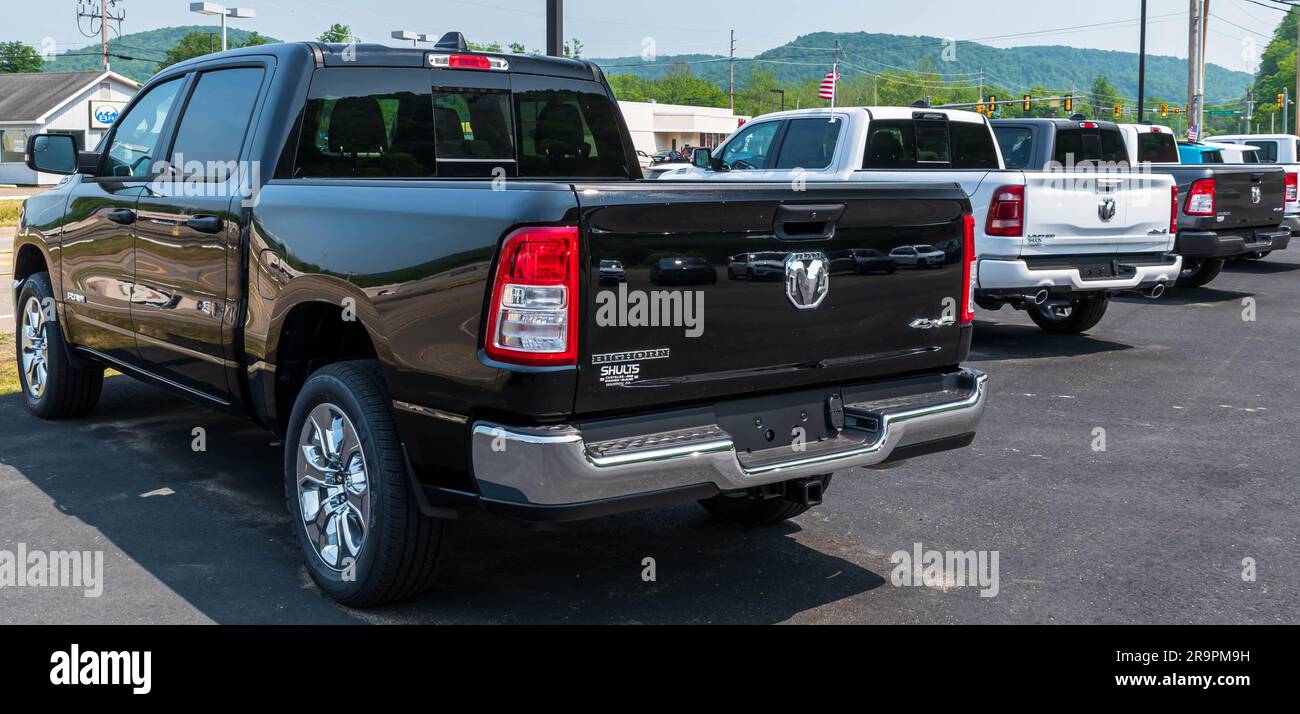 Different new Dodge Ram pick up trucks lined up for sale at a ...