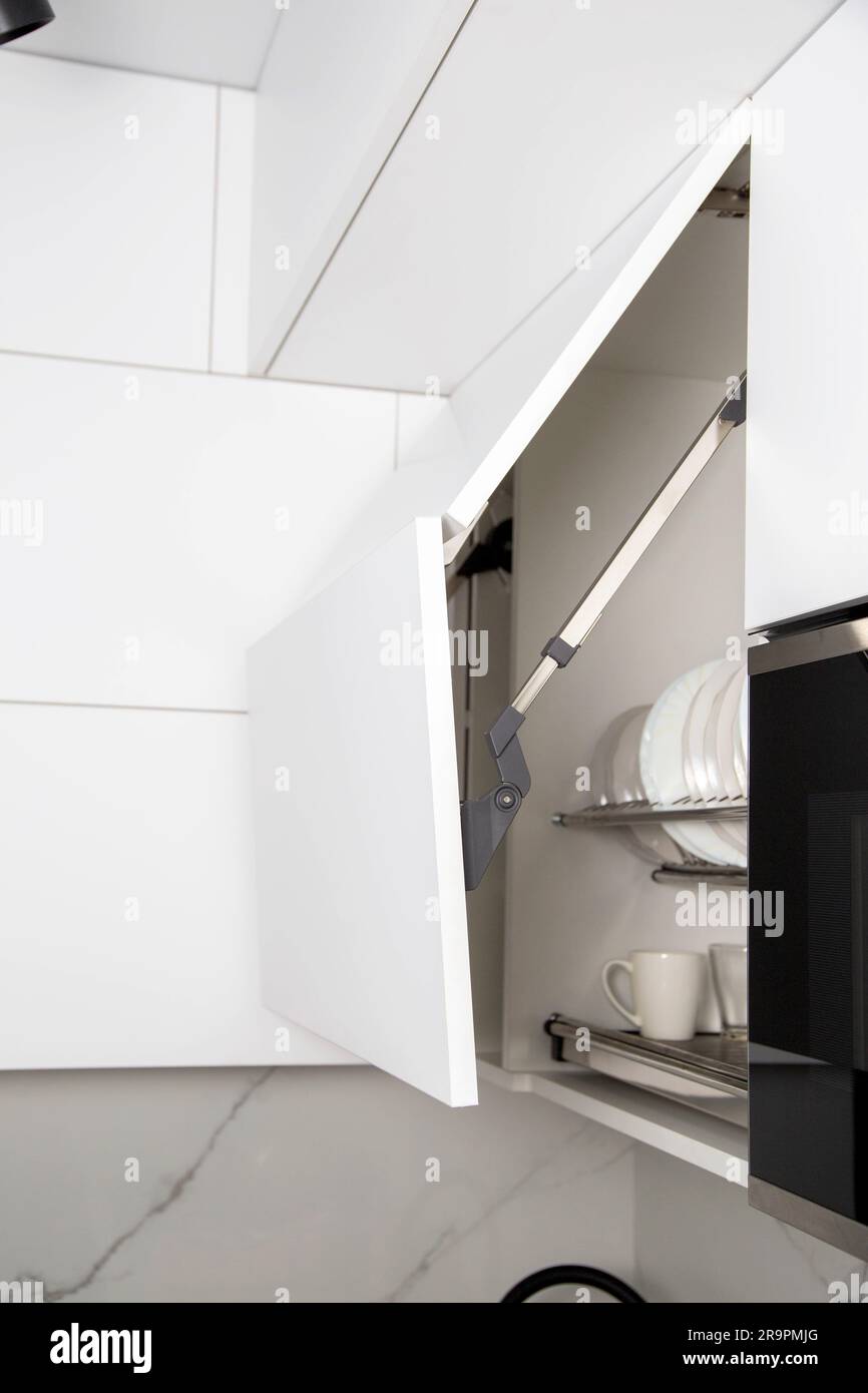 The modern lifting mechanism of a facade of a door with the closer ...