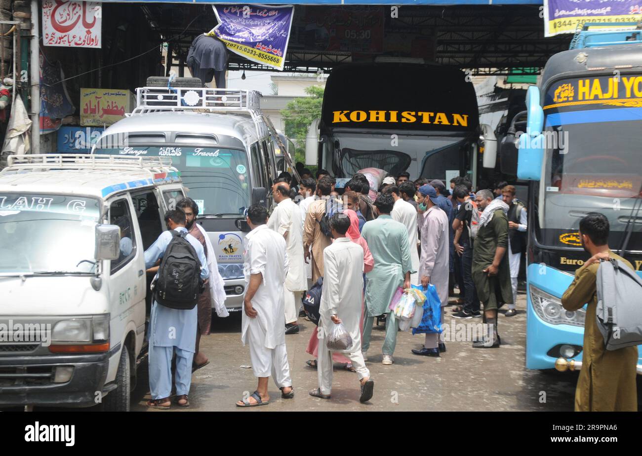 Rawalpindi Pakistan, Pakistan. 28th June, 2023. People gather at a bus ...