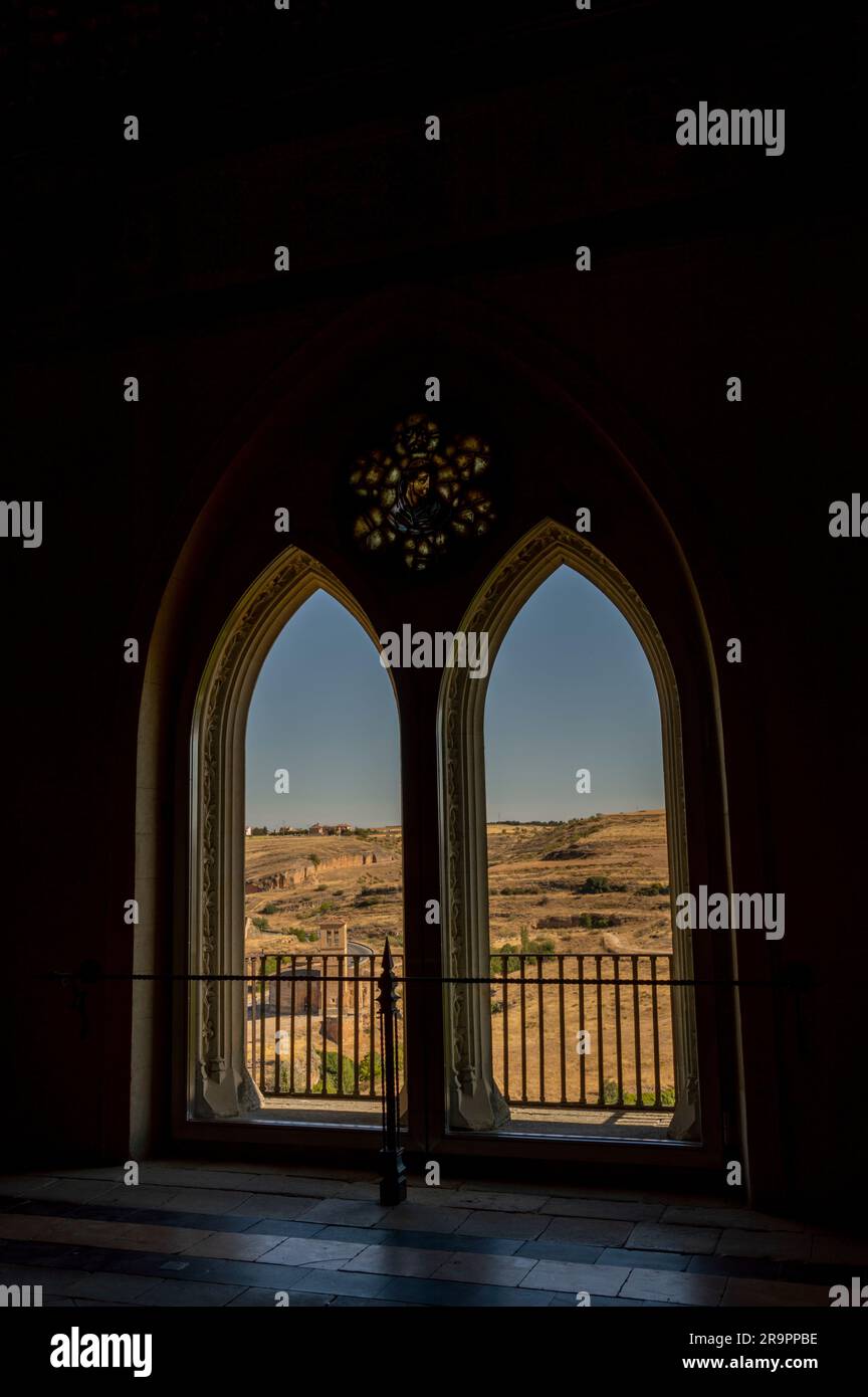 arched upper windows where the natural landscape outside can be ...