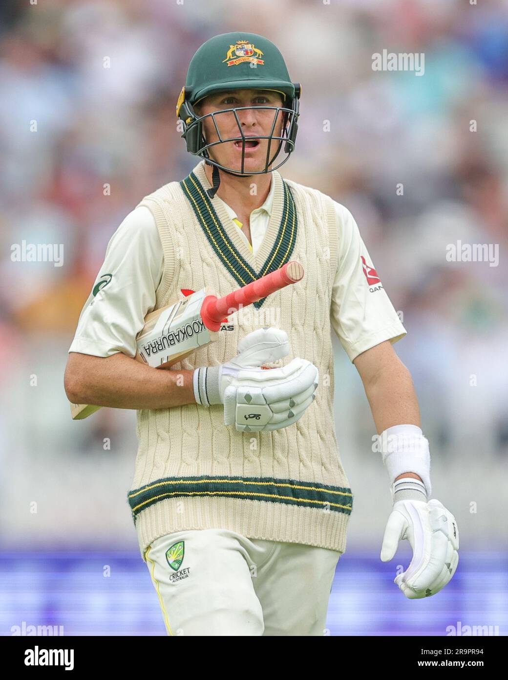 Marnus Labuschagne of Australia walks back to the dressing room after being caught out by ...