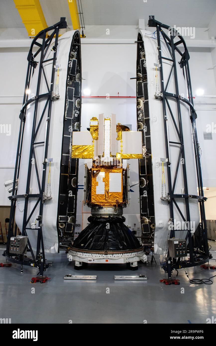 SWOT Spacecraft Encapsulated in Payload Fairing. Technicians ...