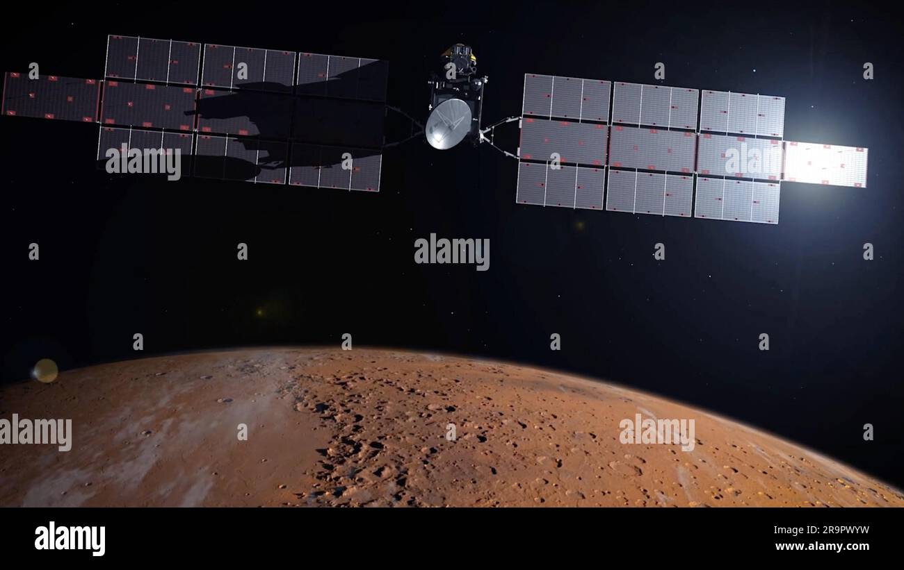 Artist's concept of the Earth Return Orbiter over Mars. The Earth ...