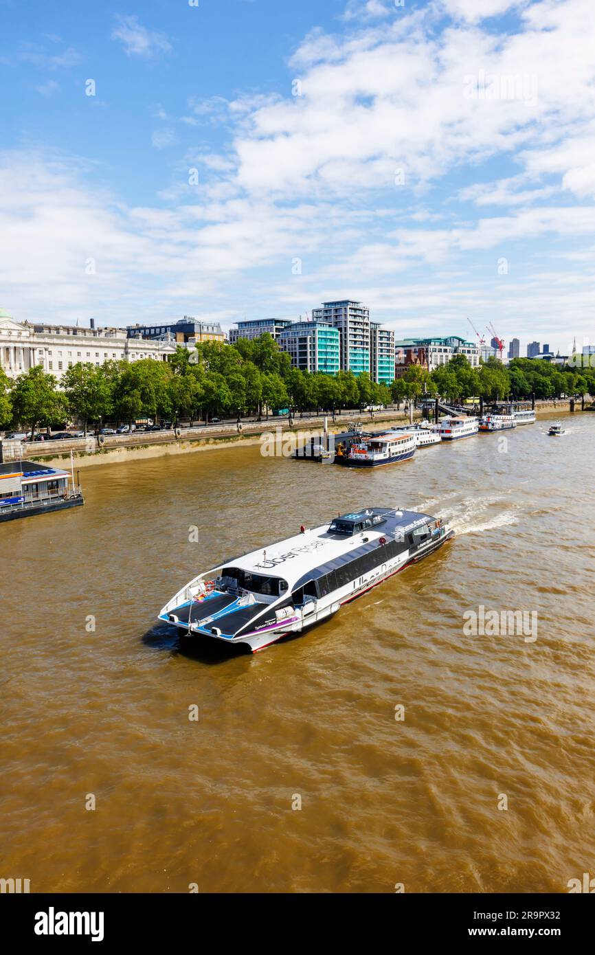 Thames Clipper Uber Boat 'Typhoon Clipper' sails on the River Thames ...